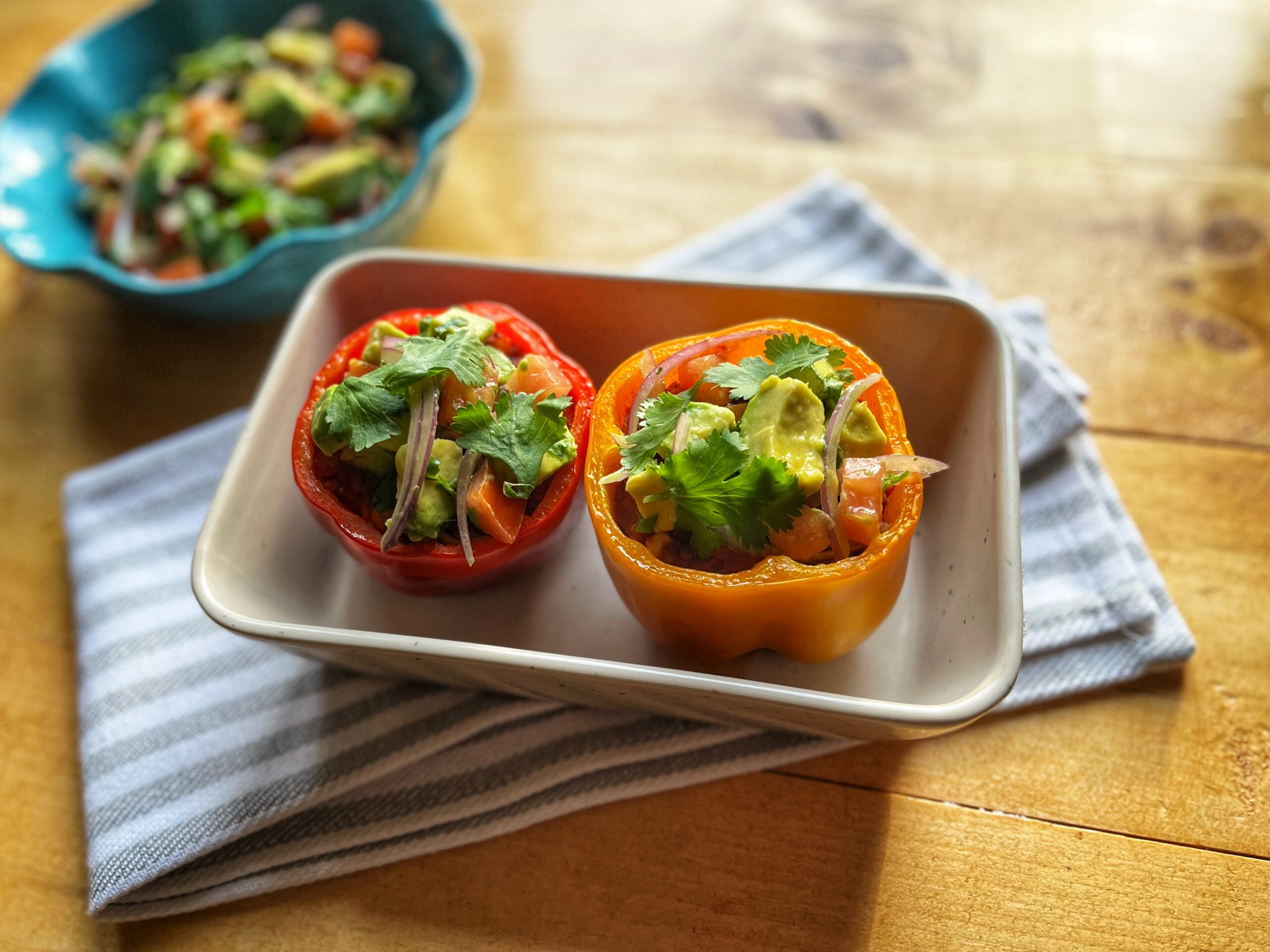 Mexican Tempeh Stuffed Peppers with Avocado Salad - Food with Purpose UHG
